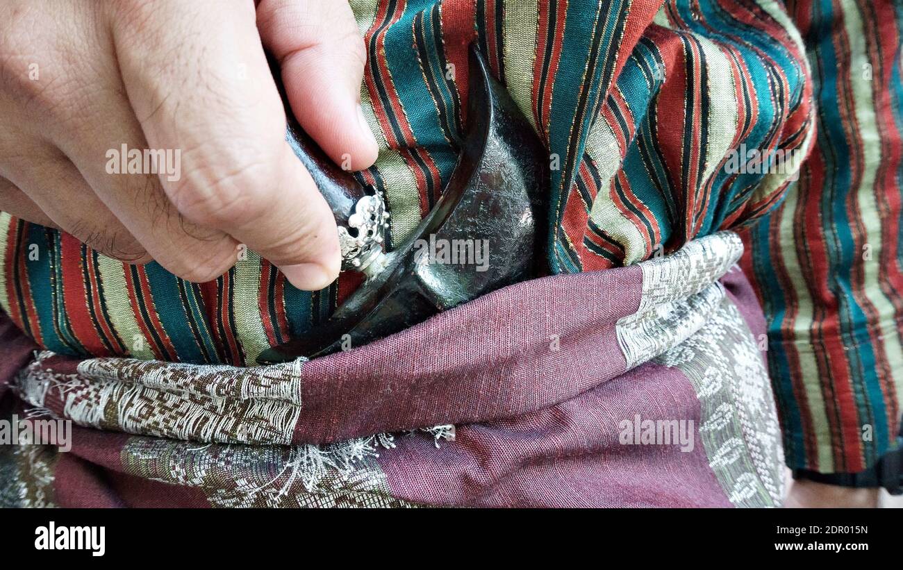 Holding dagger hi-res stock photography and images - Alamy