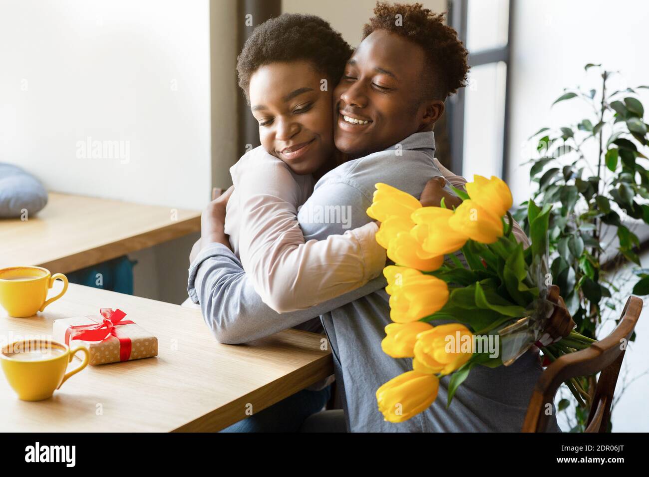 African american couple hugging other hi-res stock photography and ...