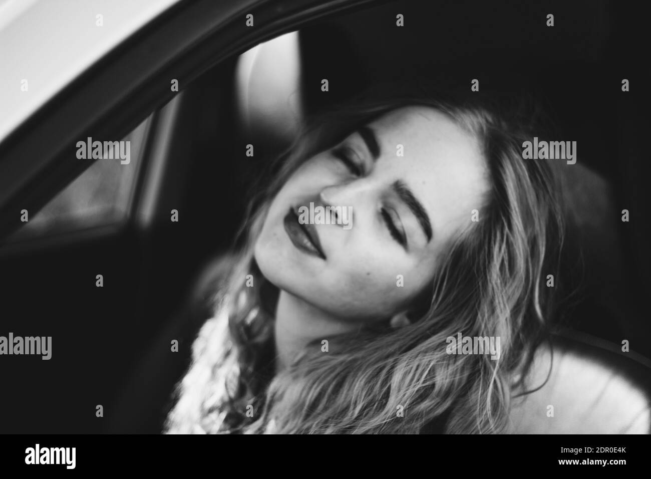 Portrait Of Beautiful Woman In Car Stock Photo - Alamy