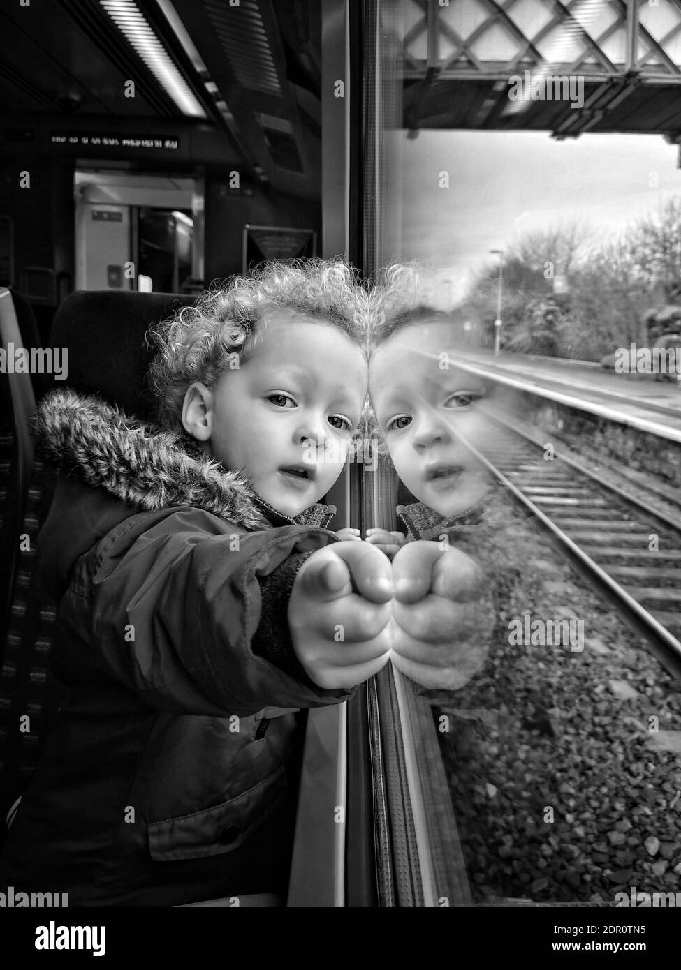 Train girls window Black and White Stock Photos & Images - Alamy