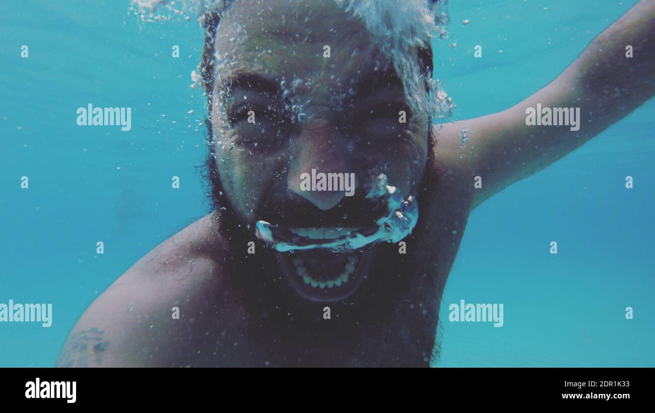 Indian man in swimming pool hi-res stock photography and images - Alamy
