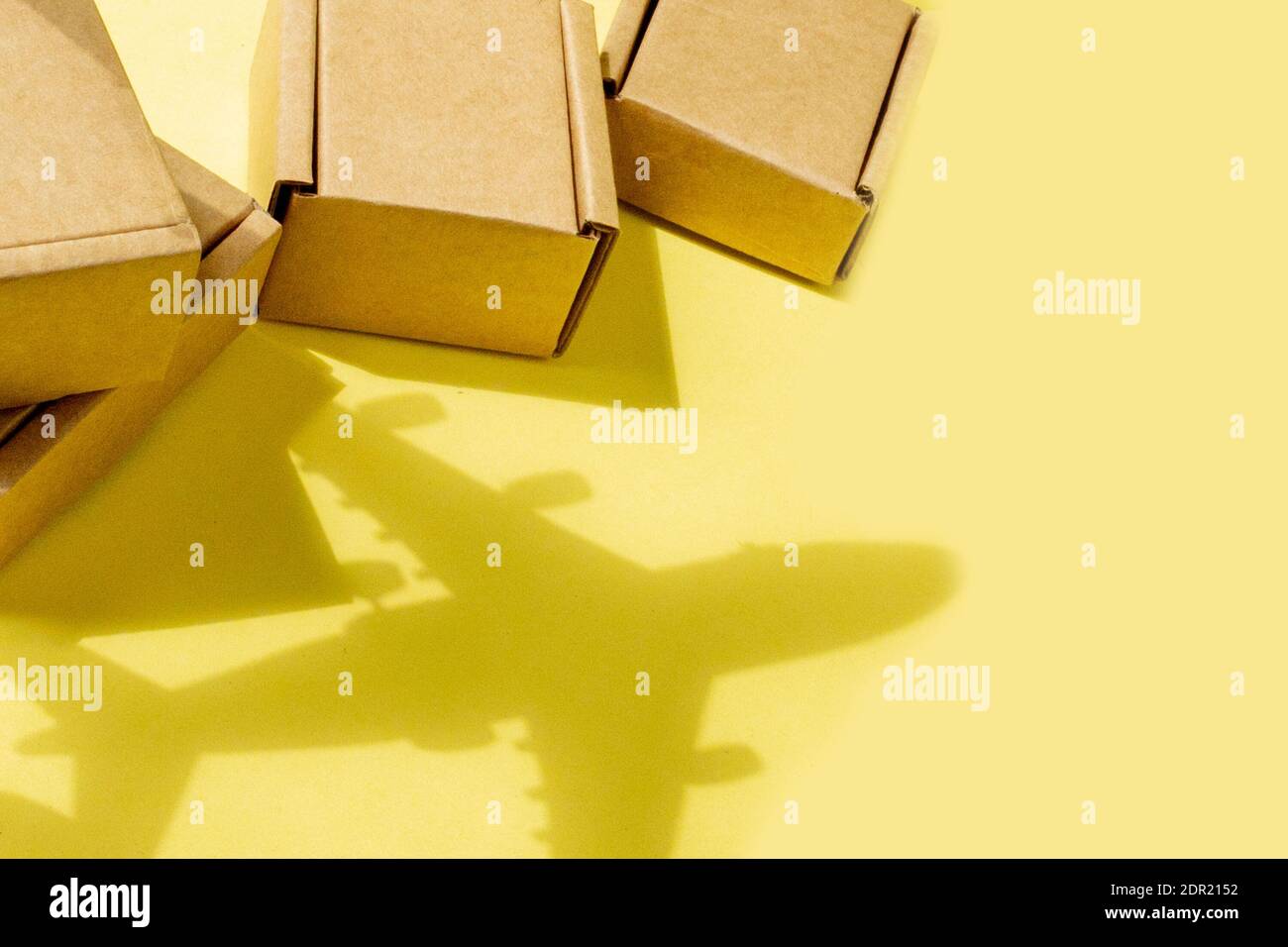 Shadow Airplane and stack of cardboard boxes. concept of air cargo and ...