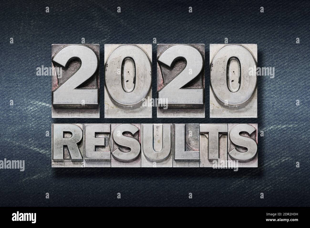 results 2020 preview 2021 phrase made from metallic letterpress on dark ...