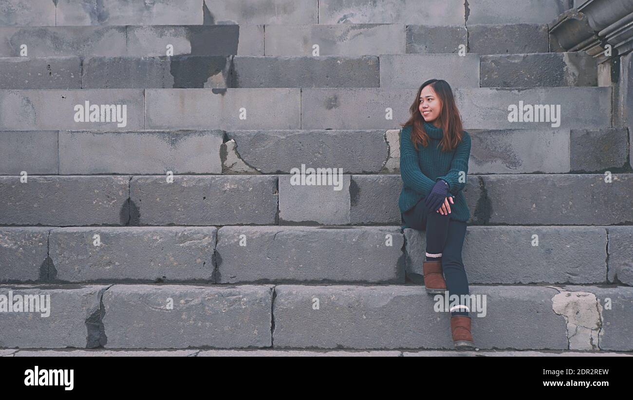 Young Woman Sitting Steps Stock Photo - Alamy