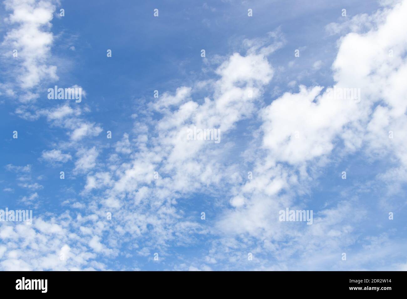 Clear blue color sky with white cloud background Stock Photo - Alamy