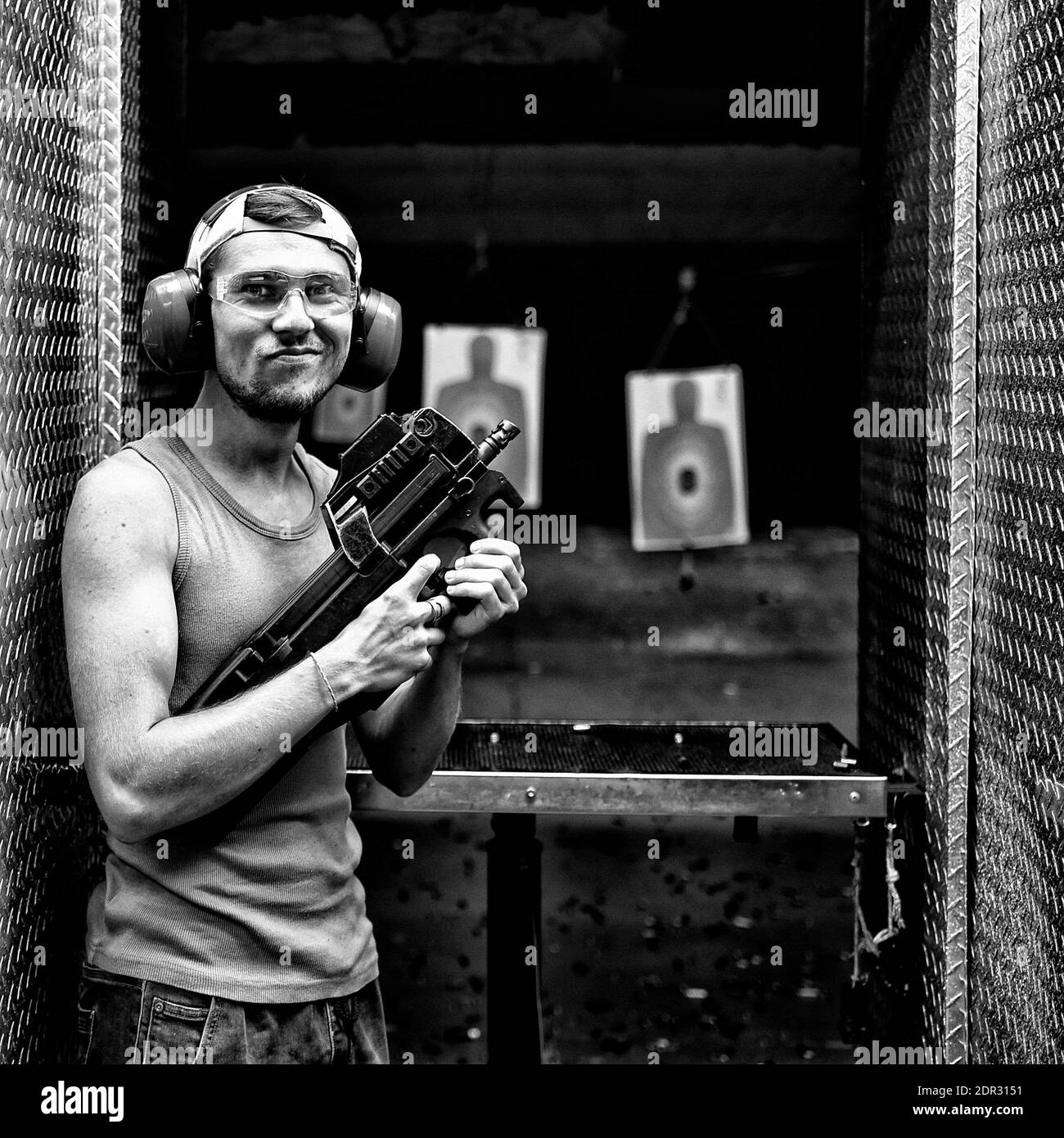 Man shooting target gun Black and White Stock Photos & Images - Alamy