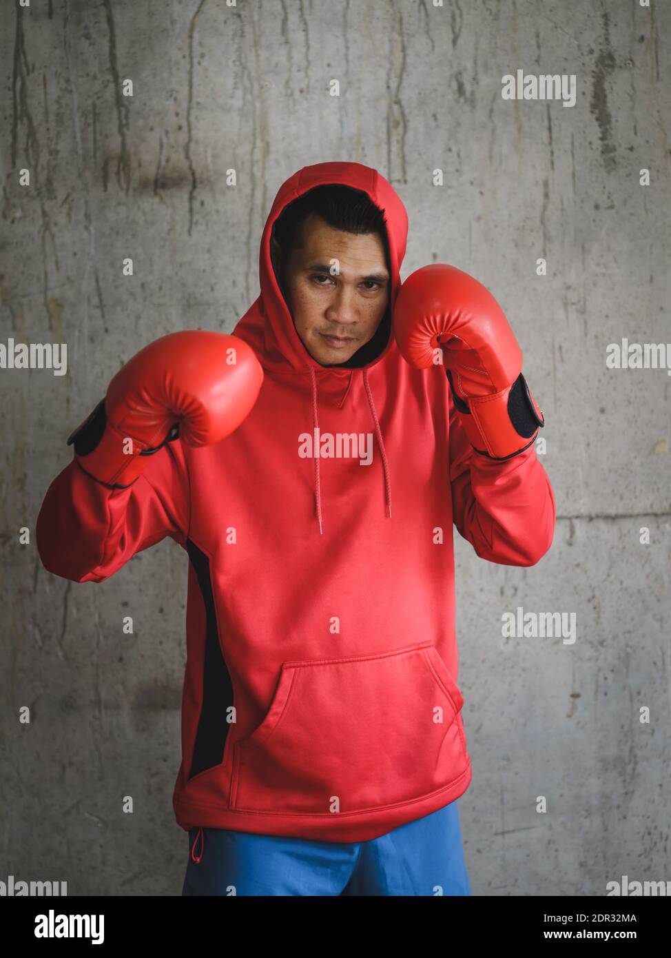 Portrait male boxer punching camera hi-res stock photography and images ...