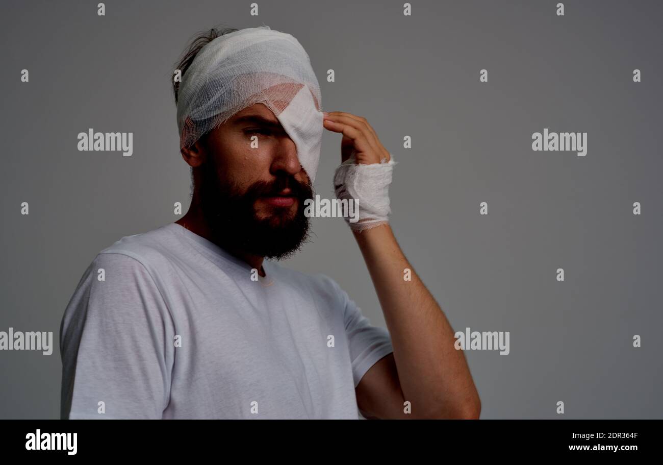 male patient with bandaged head injury health problems hospitalization ...
