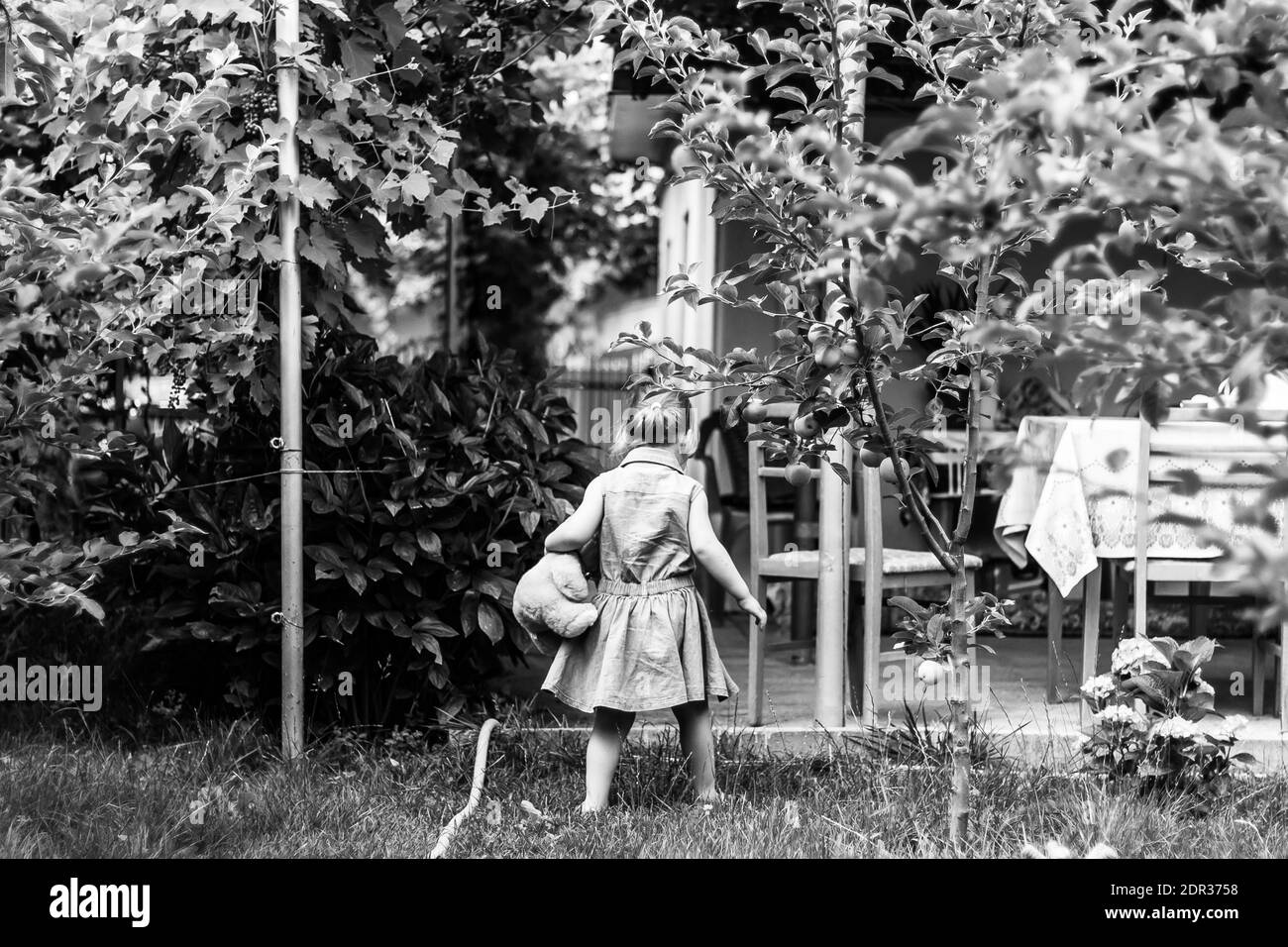 Child back view play Black and White Stock Photos & Images - Alamy