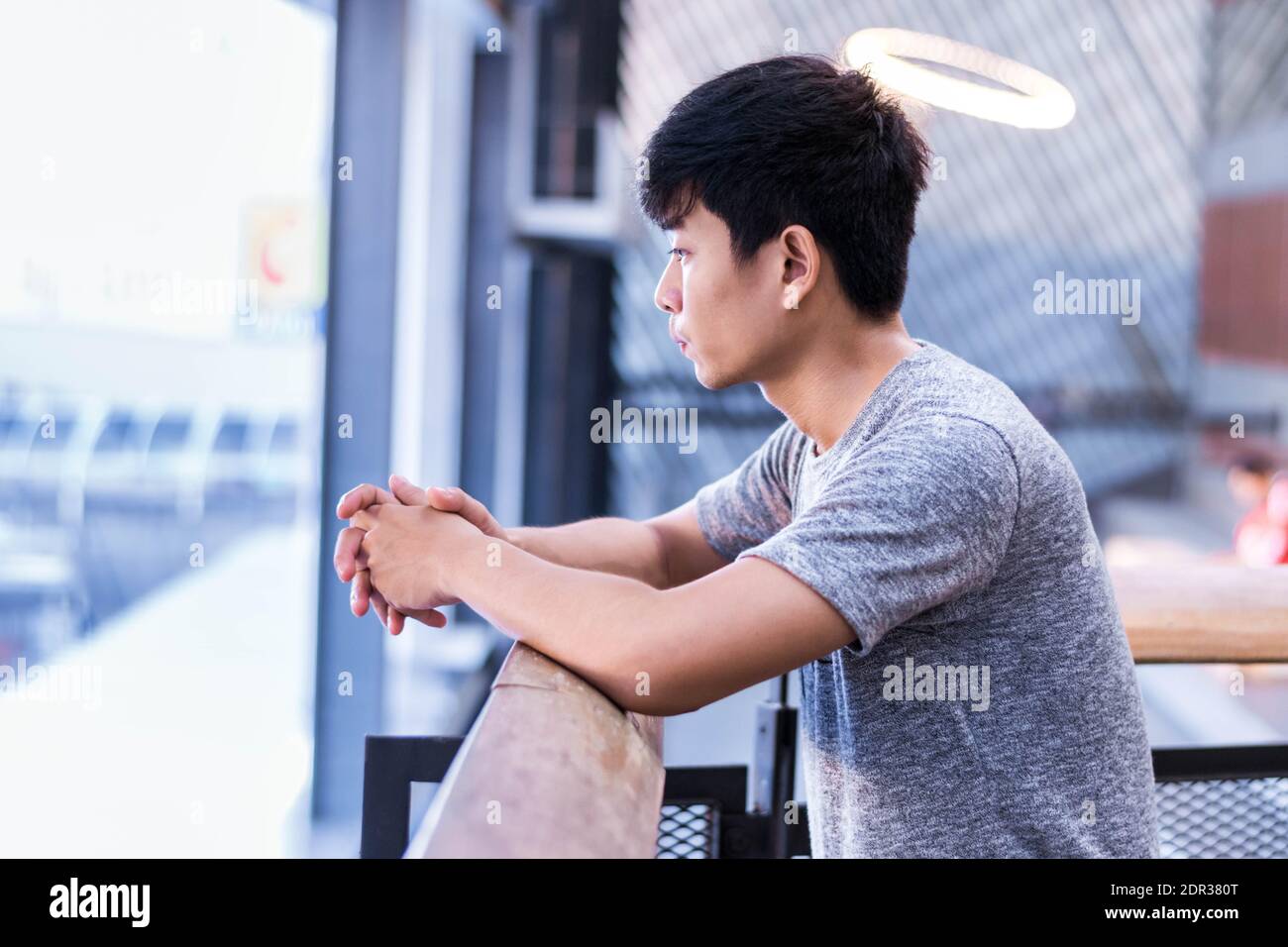 Man Leaning On Railing High Resolution Stock Photography and Images - Alamy