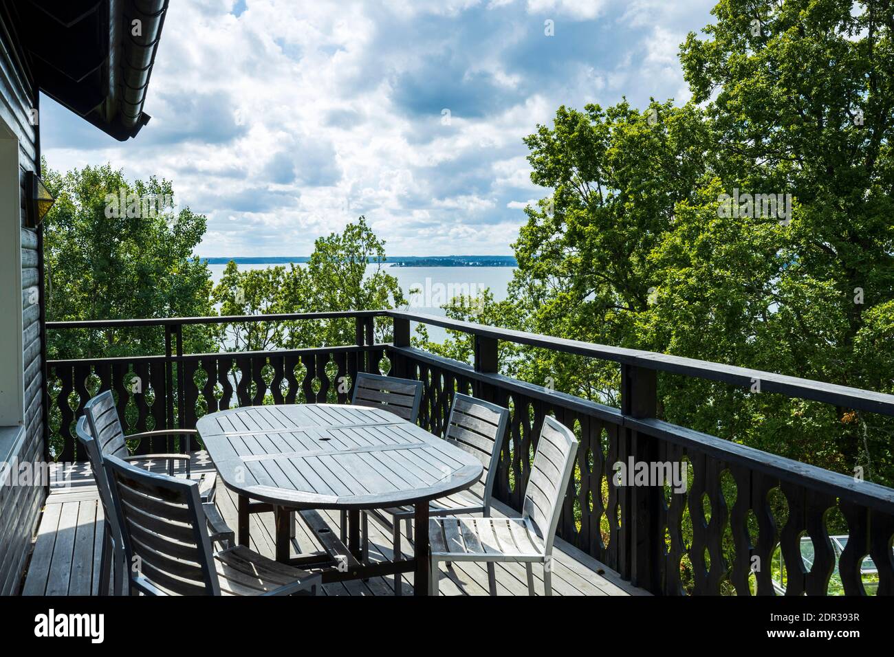Overview of outdoor wooden veranda around private house with gorgeous ...