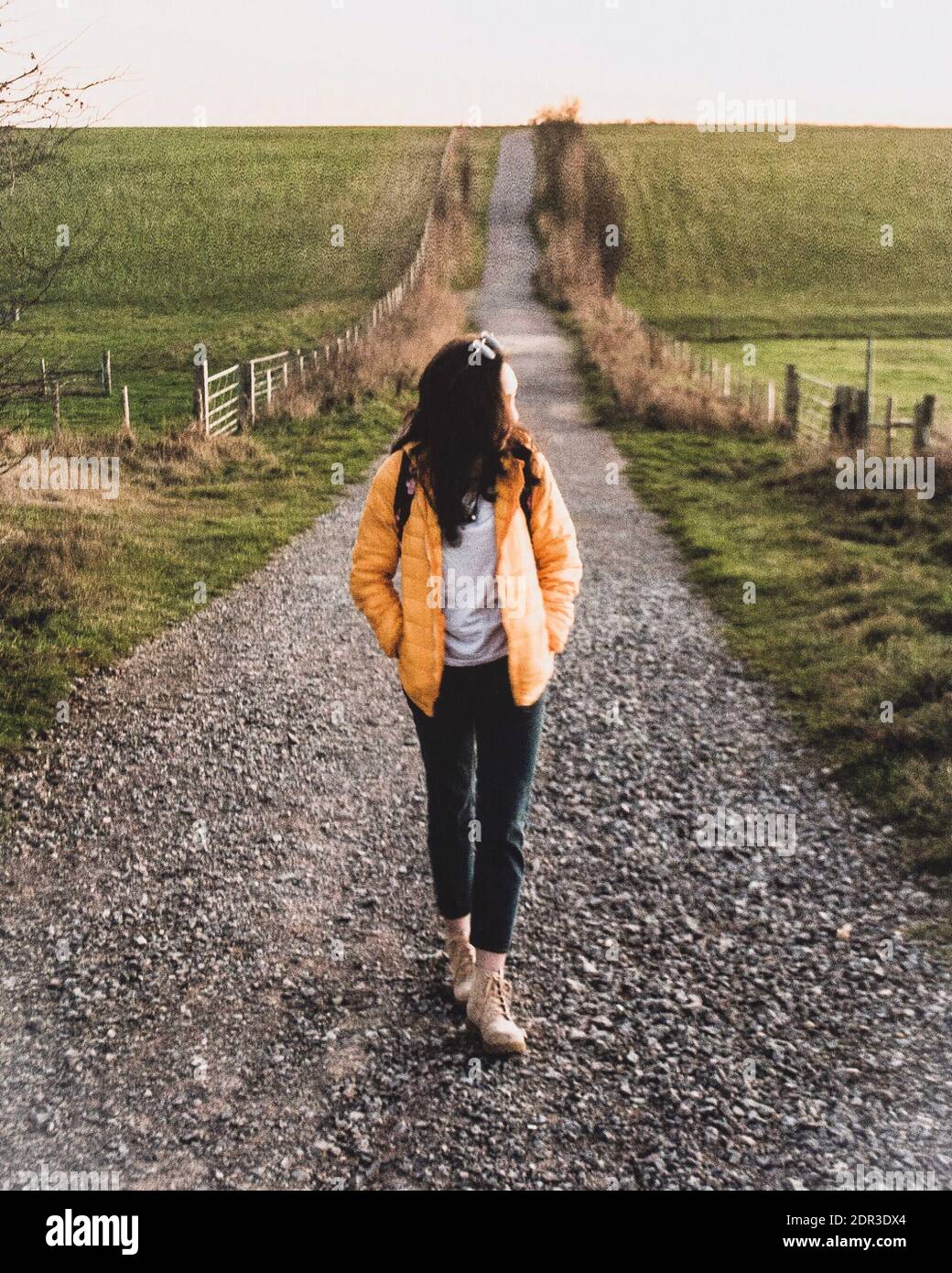 Full Length Of Woman Walking On Road Stock Photo - Alamy