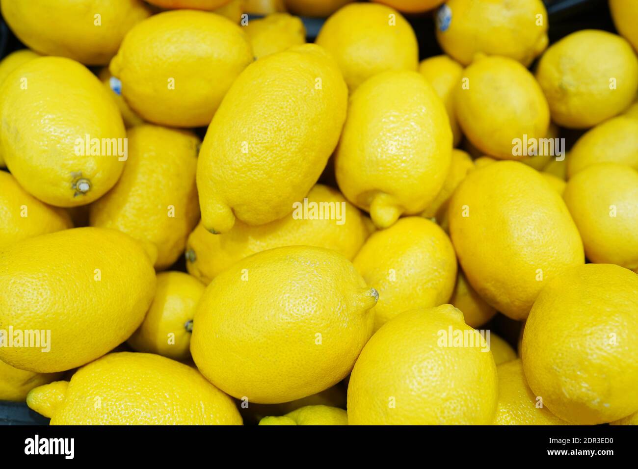 Colorful Lemons on the shelf In Market, healthy food Stock Photo - Alamy