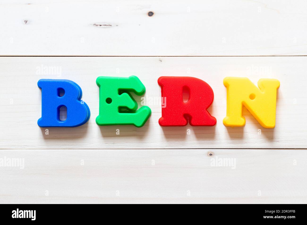 Letter block in word Bern on white wood background Stock Photo - Alamy
