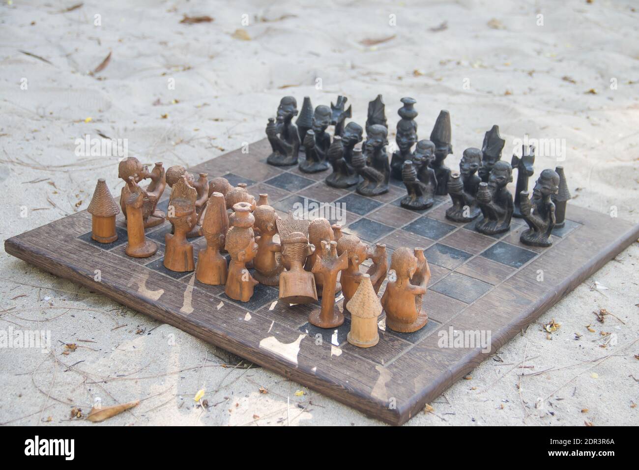 African wooden hand made chess Stock Photo - Alamy