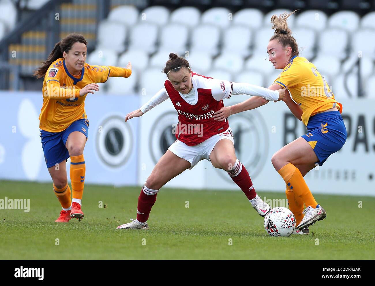 Arsenal goalkeeper Lydia Williams (centre) battles for the ball with ...