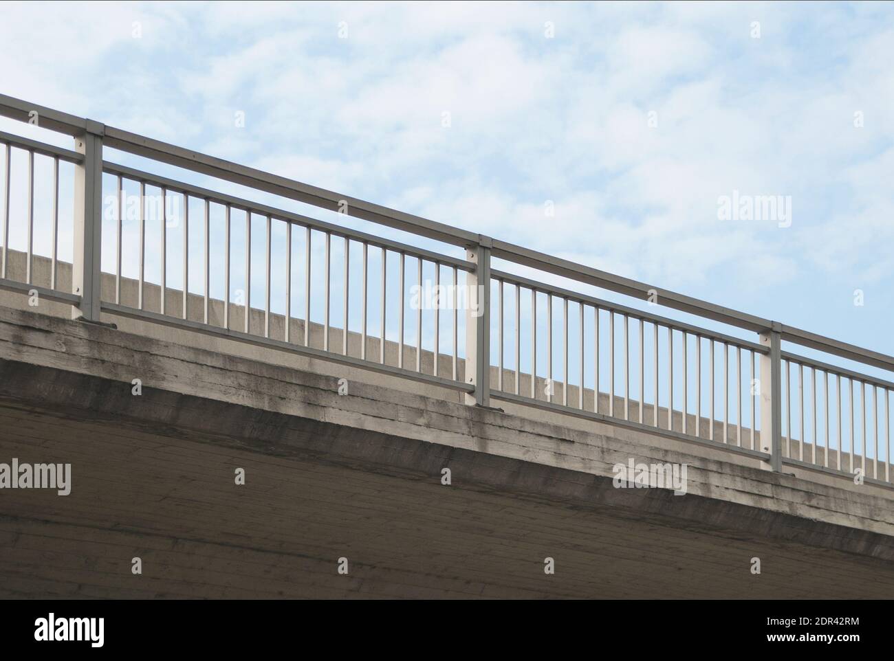 Iron barrier on the bridge against the blue sky Stock Photo - Alamy