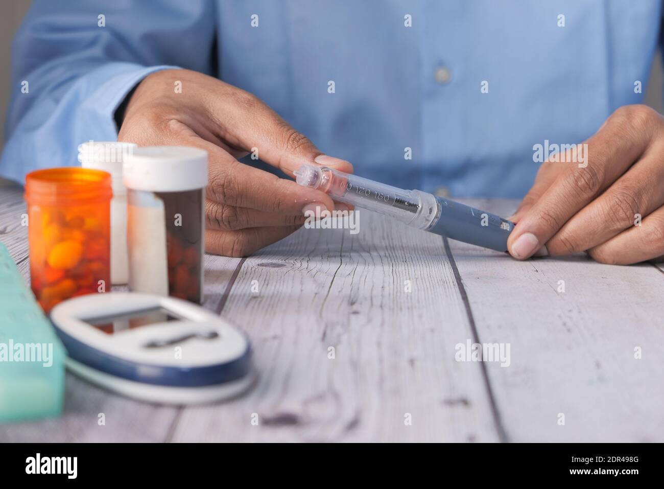 hand holding Insulin pens with copy space, Top down Stock Photo - Alamy