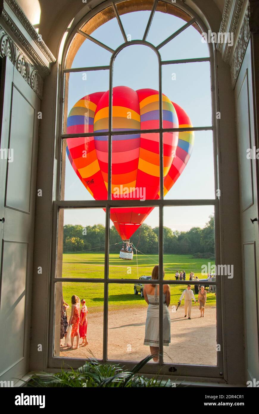 Balloon through the window Stock Photo - Alamy