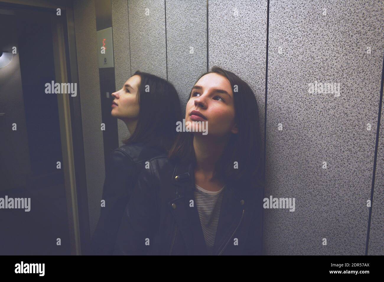 People in mirror elevator hi-res stock photography and images - Alamy