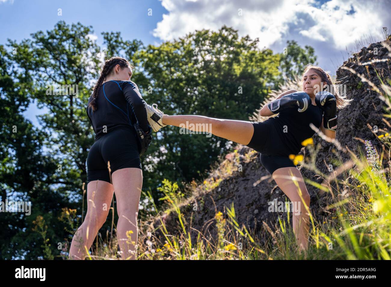 Pretty young girls practices boxing Stock Photo - Alamy