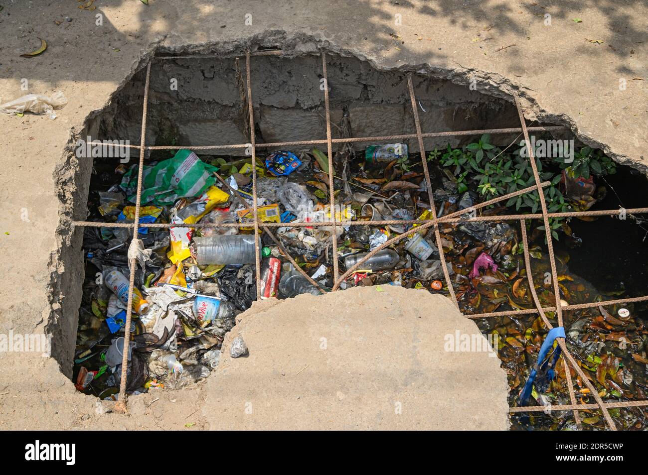 Plastic rubbish in gutter, Mandroseza, Antananarivo, Madagascar Stock ...