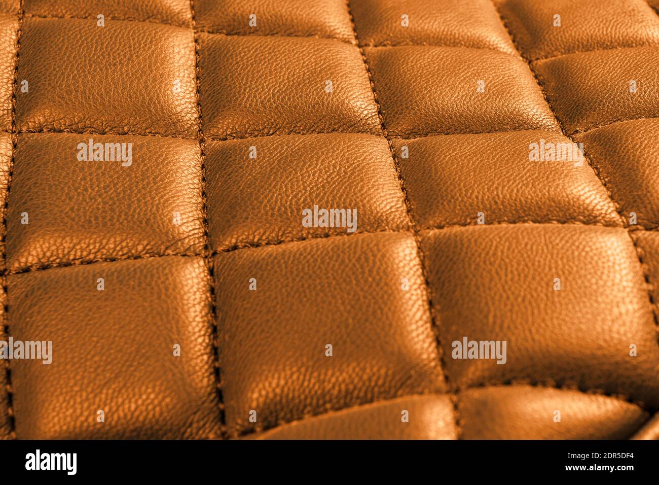 Modern luxury car brown leather interior. Part of perforated leather ...