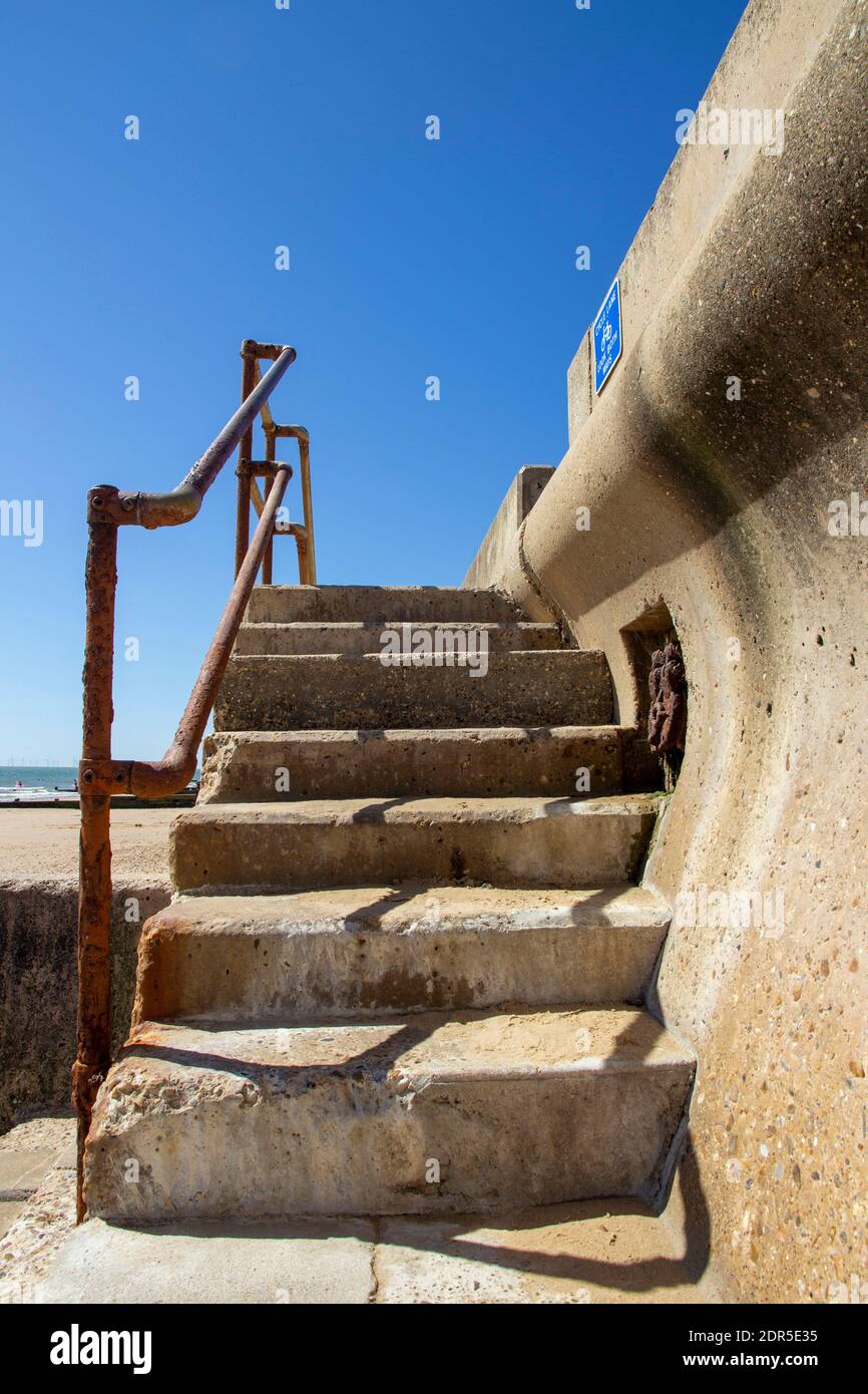 Stone steps on sea wall, Walton on the Naze, England Stock Photo - Alamy