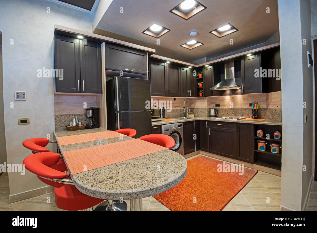 Interior design decor showing open plan modern kitchen and appliances ...