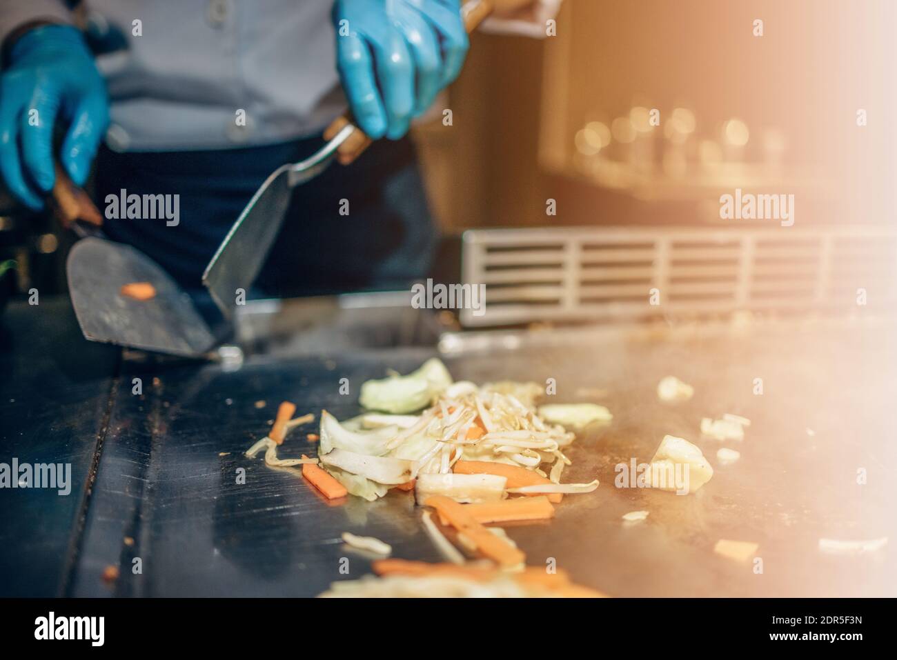 Hand of man take cooking of meat with vegetable grill, Chef cooking ...