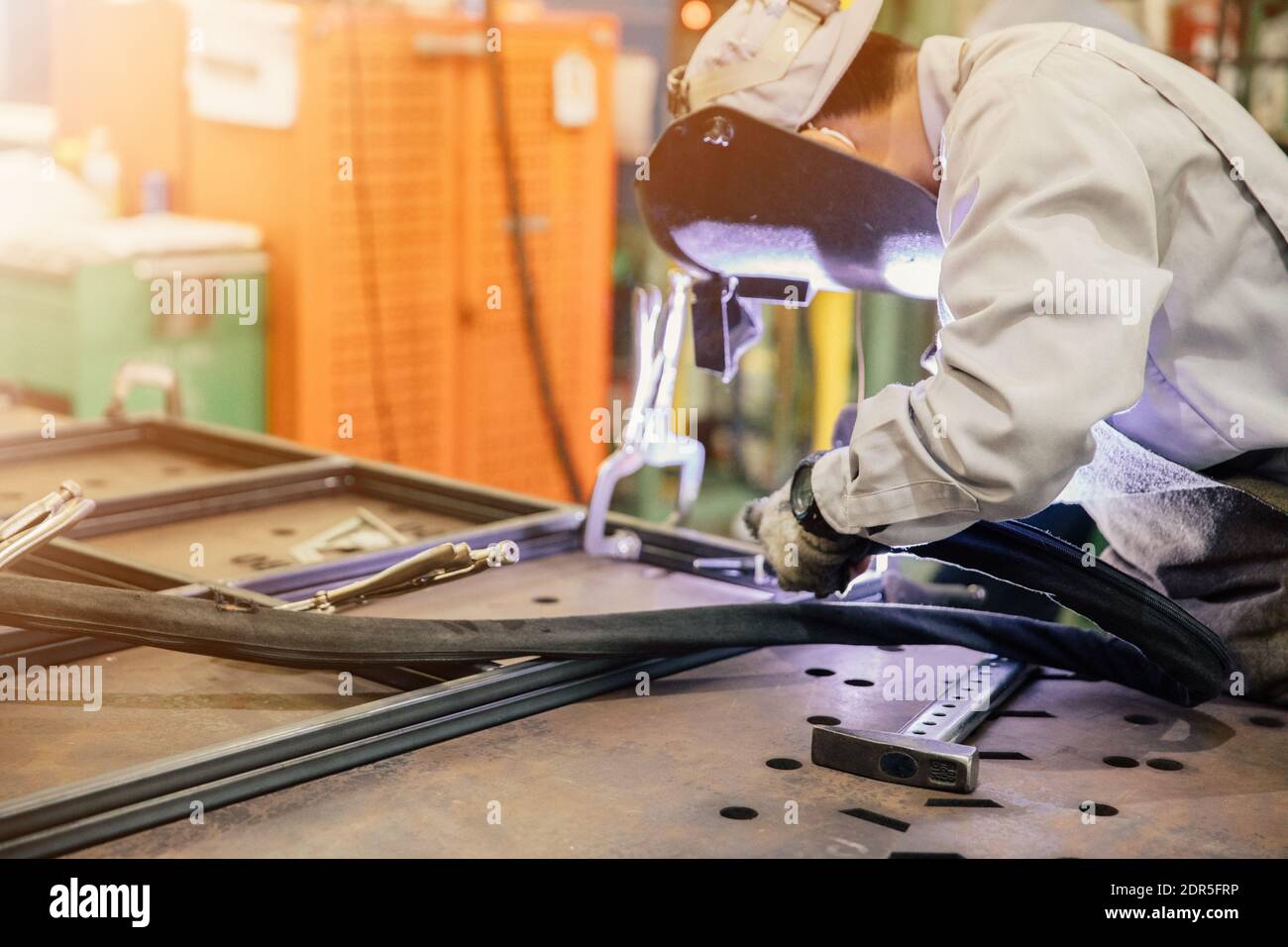 Craftsman grinding pipe hi-res stock photography and images - Alamy