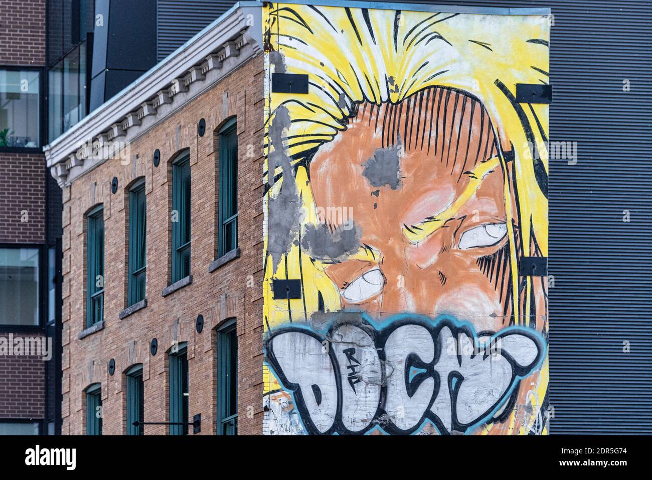 Old architecture building with graffiti in Montreal, Canada Stock Photo ...
