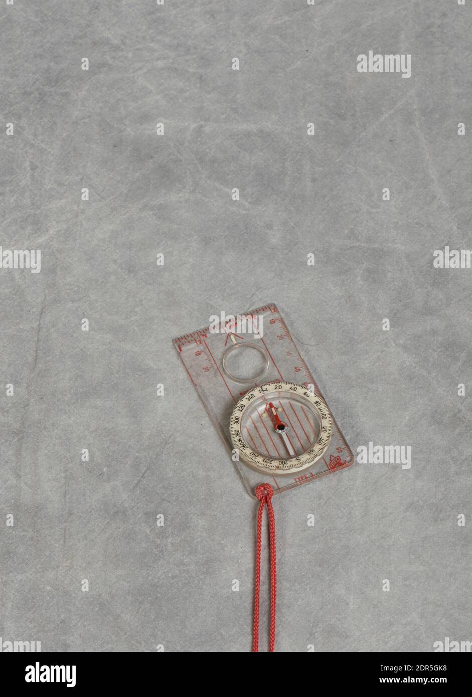 Hand-held compass for finding direction Stock Photo - Alamy