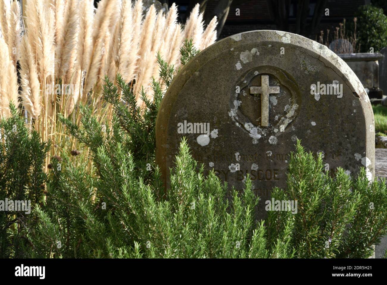 Cross on gravestone cemetery hi-res stock photography and images - Alamy