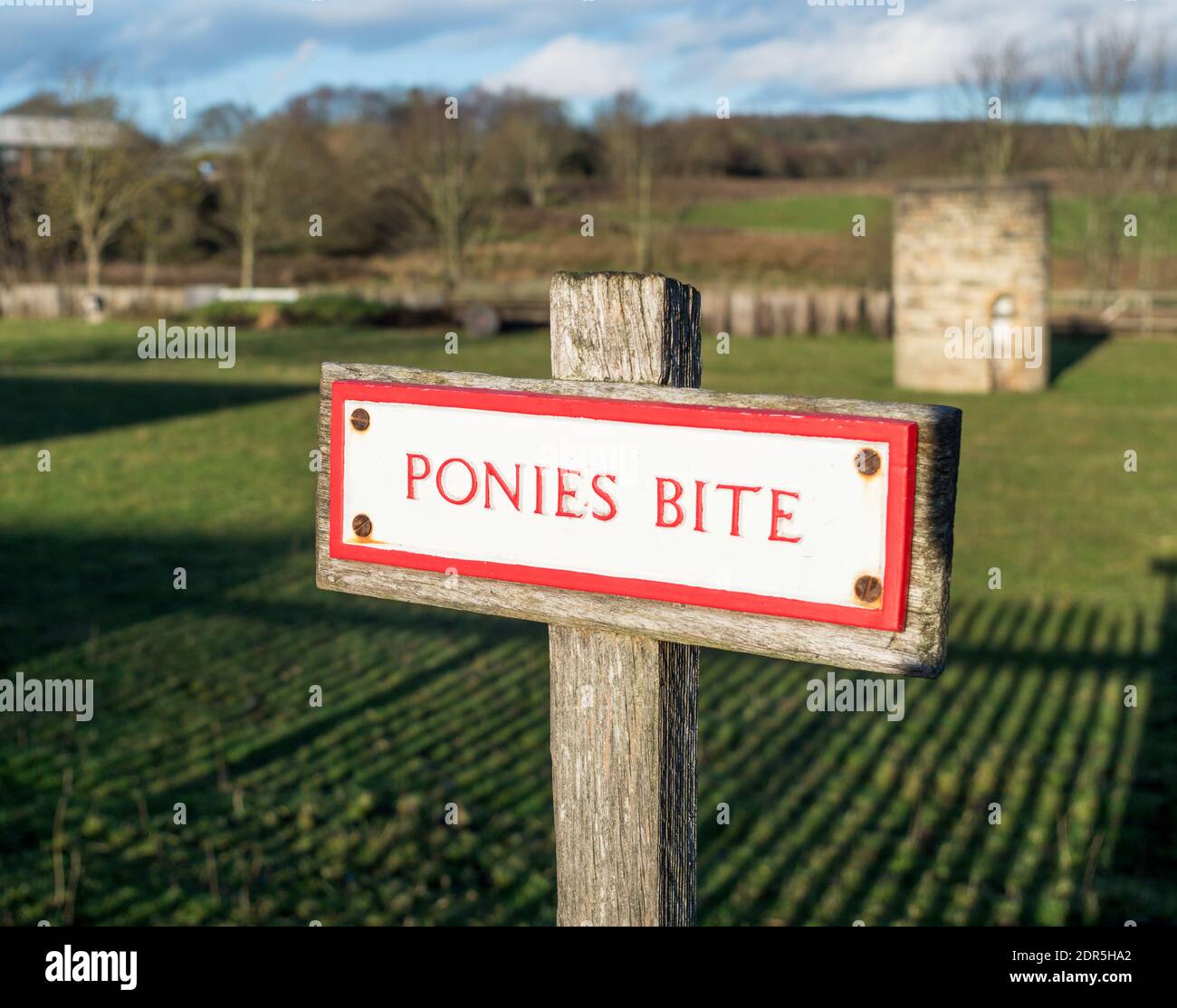 Warning sign Ponies Bite, Beamish Museum, Co. Durham, England, UK Stock ...