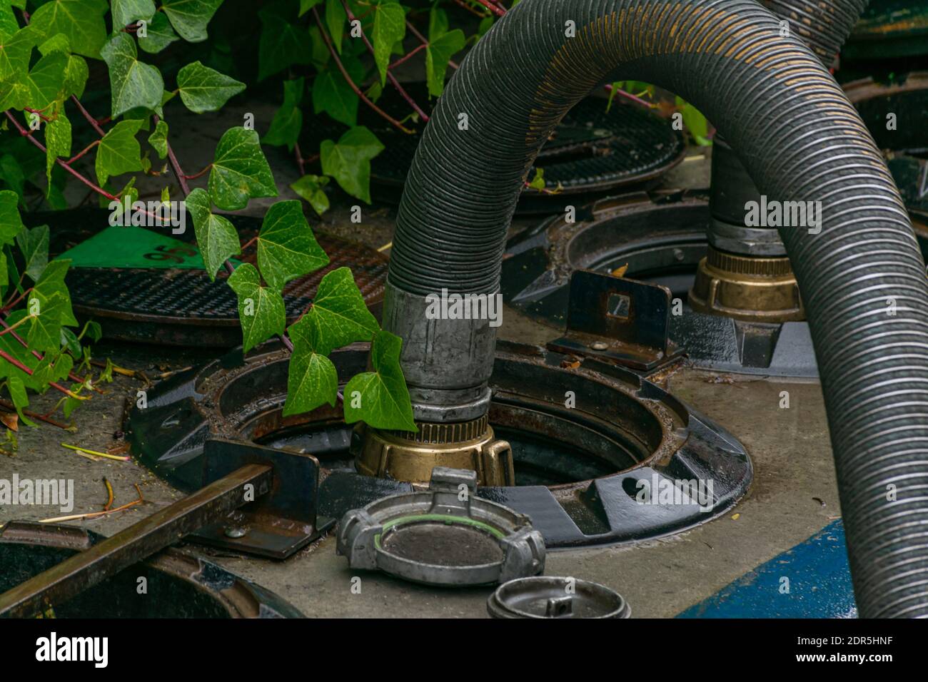 Fuel discharge, fuel hoses connected from the truck to the product ...