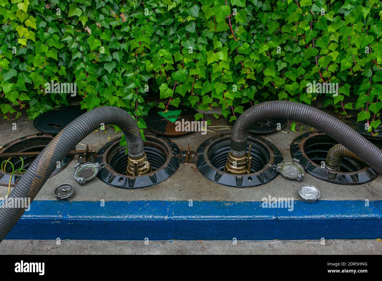 Fuel discharge, fuel hoses connected from the truck to the product ...