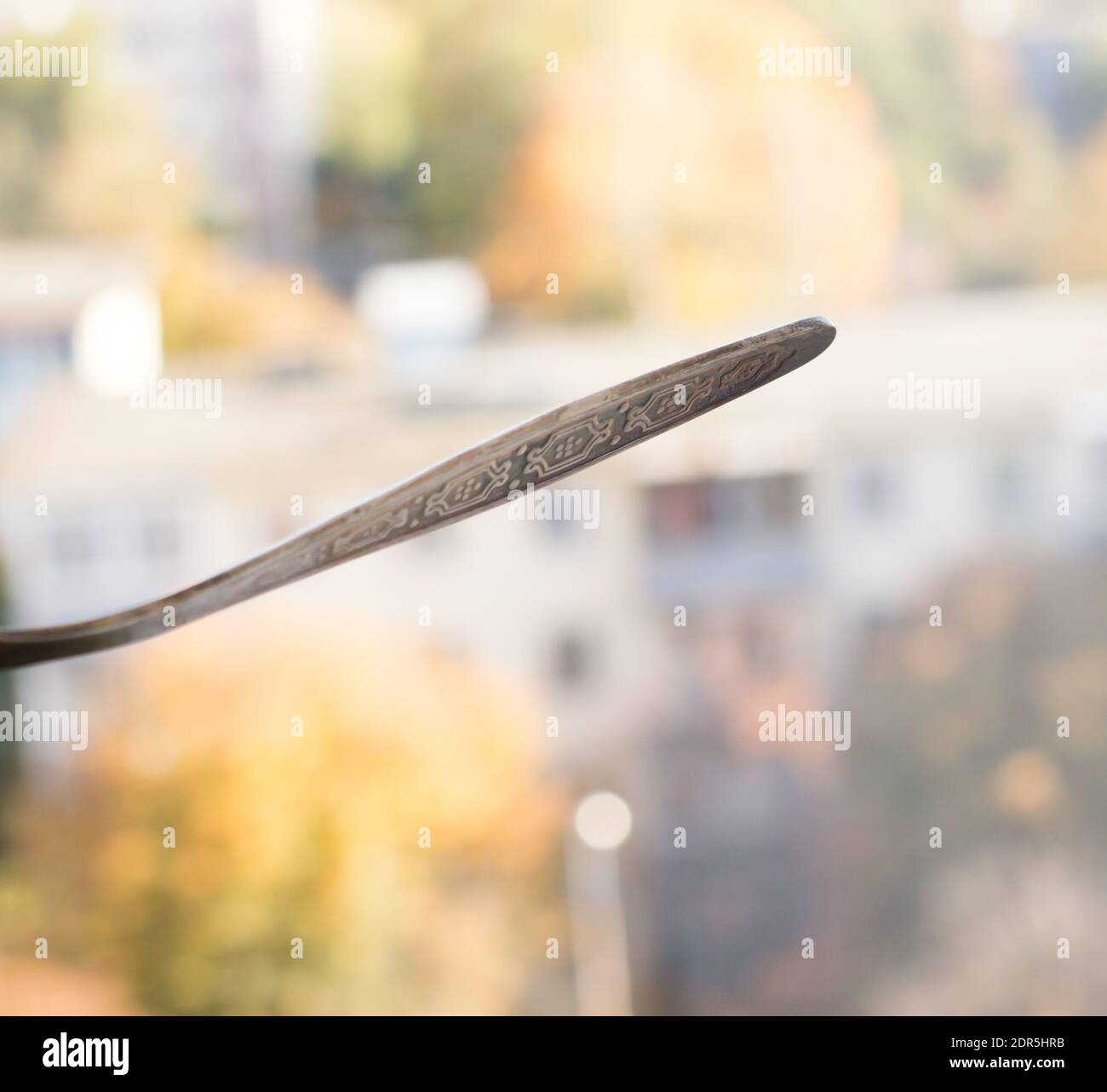 The cupronickel spoon object Stock Photo - Alamy