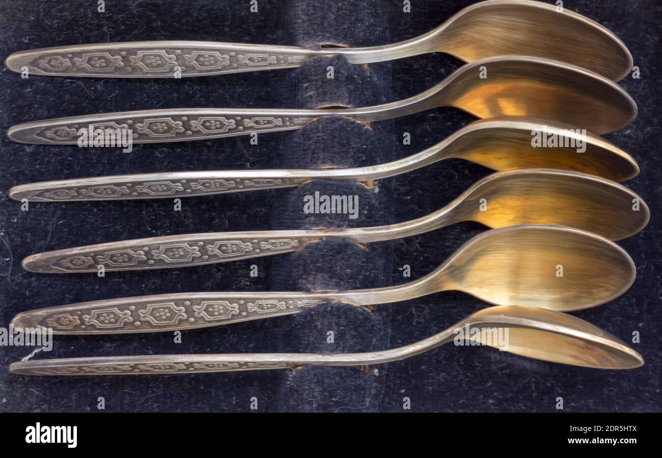 The cupronickel spoon object Stock Photo - Alamy