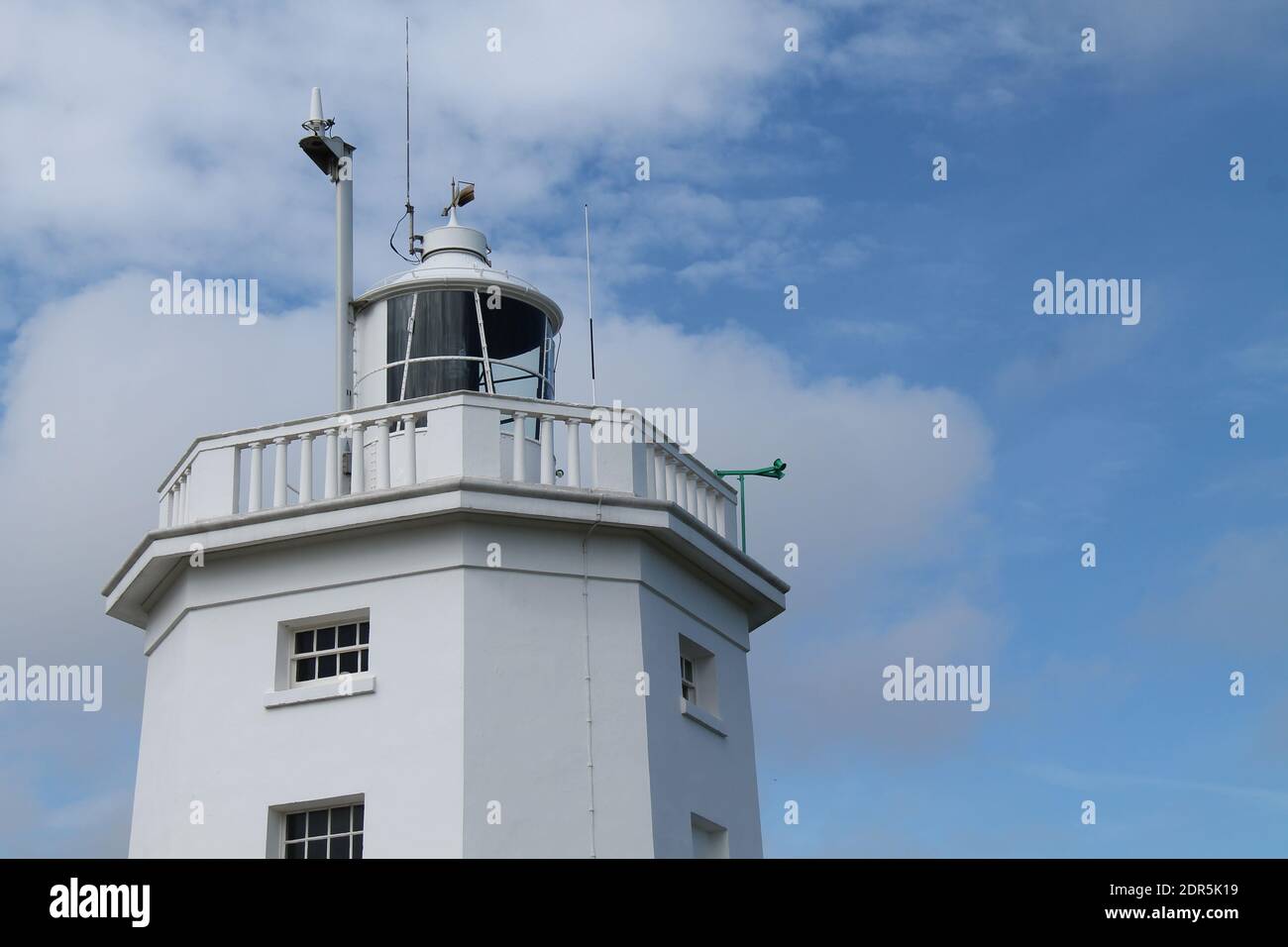 The Tower and Light of a Coastal Lighthouse Stock Photo - Alamy