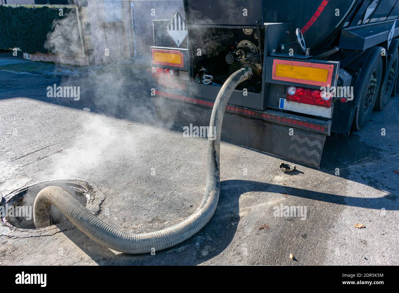 Unloading from a tanker with fuel oil by gravity to a tank on the ...