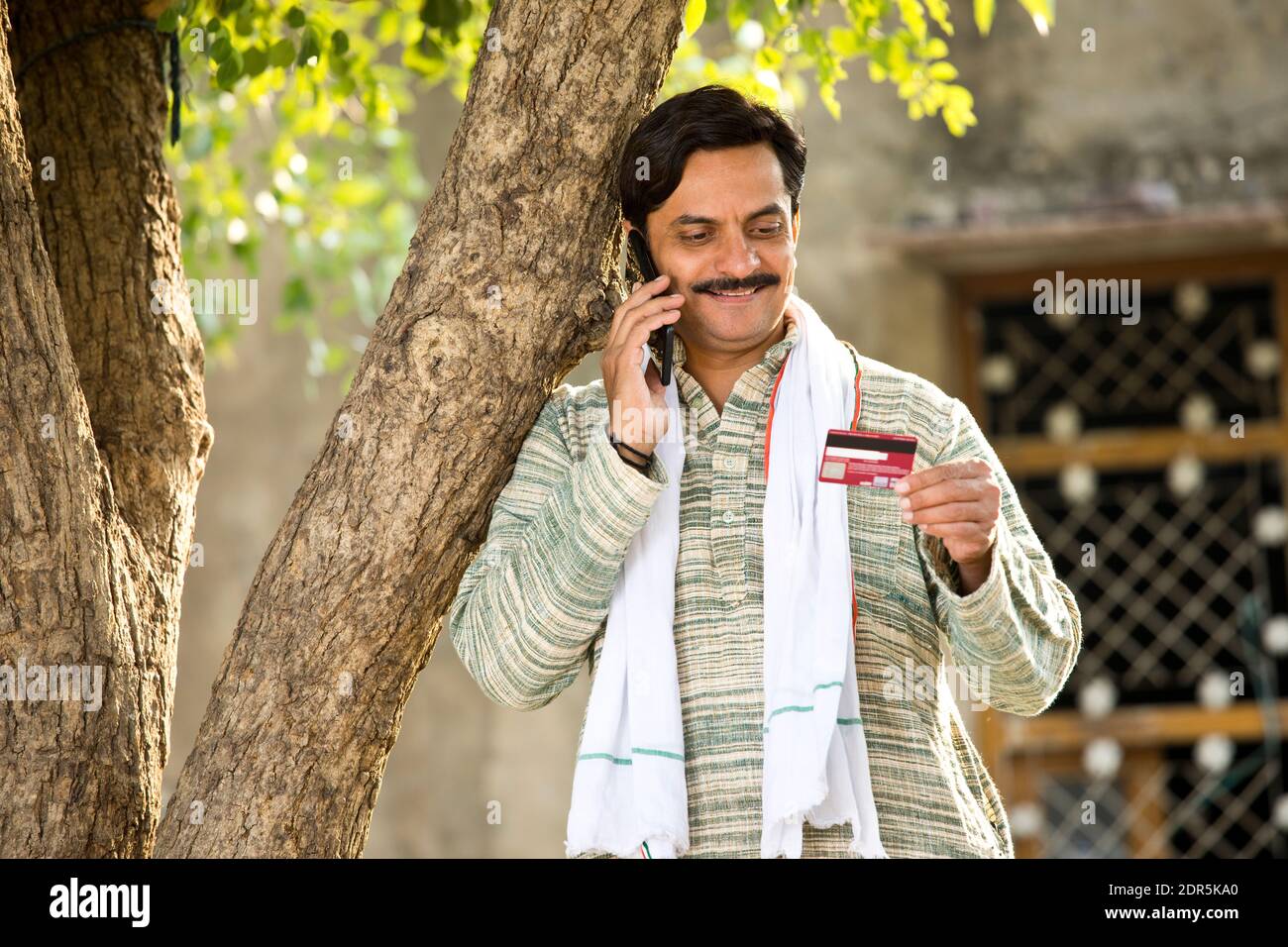 Indian farmer mobile phone hi-res stock photography and images - Alamy