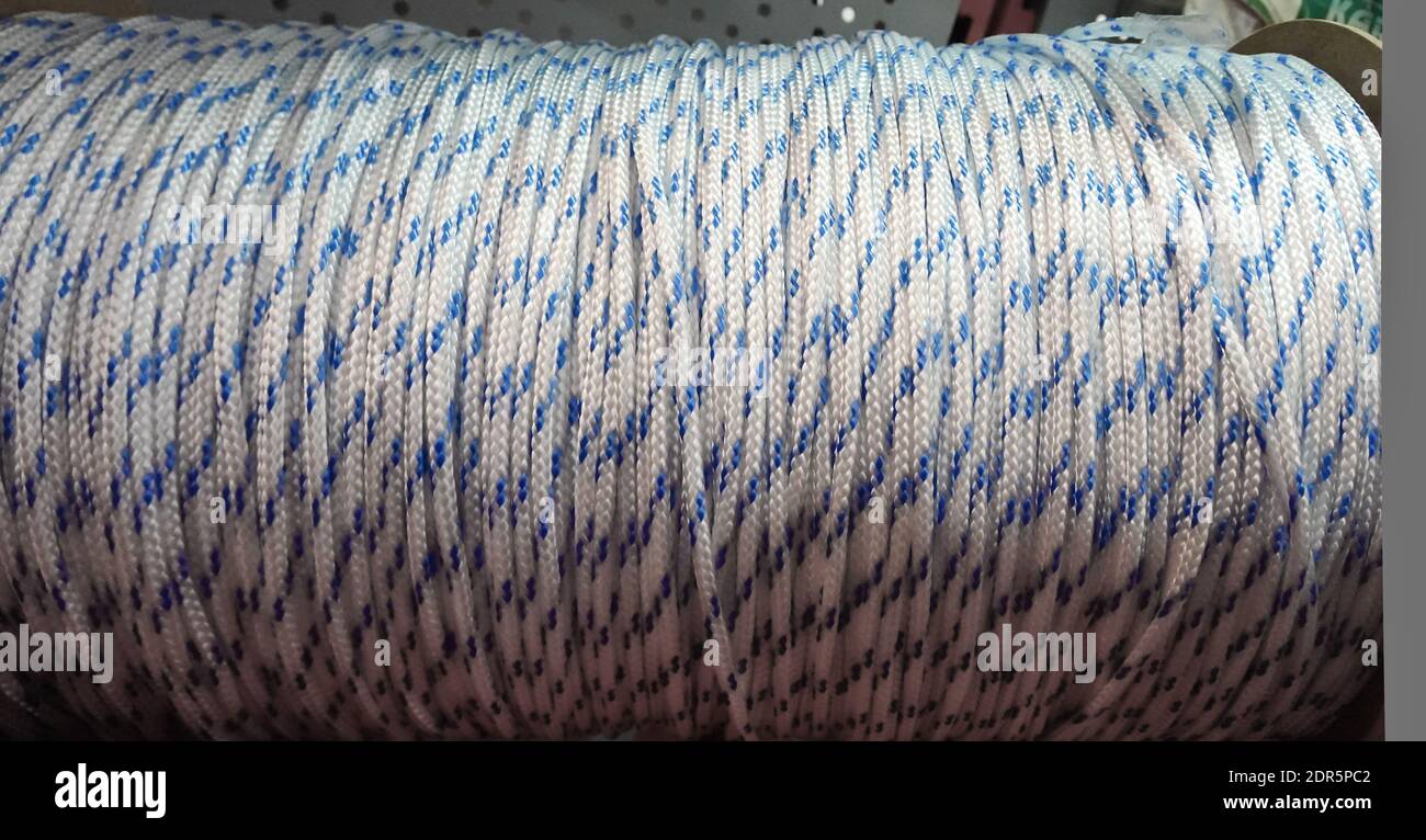 Rolled up rope Stock Photo - Alamy