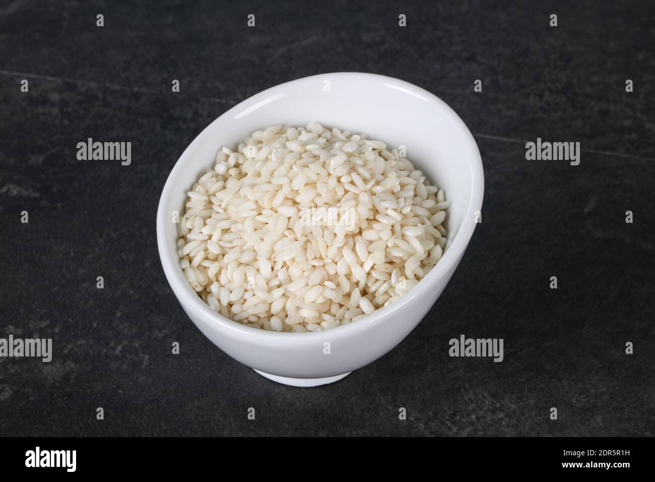 Raw Arborio rice for Italian risotto Stock Photo - Alamy