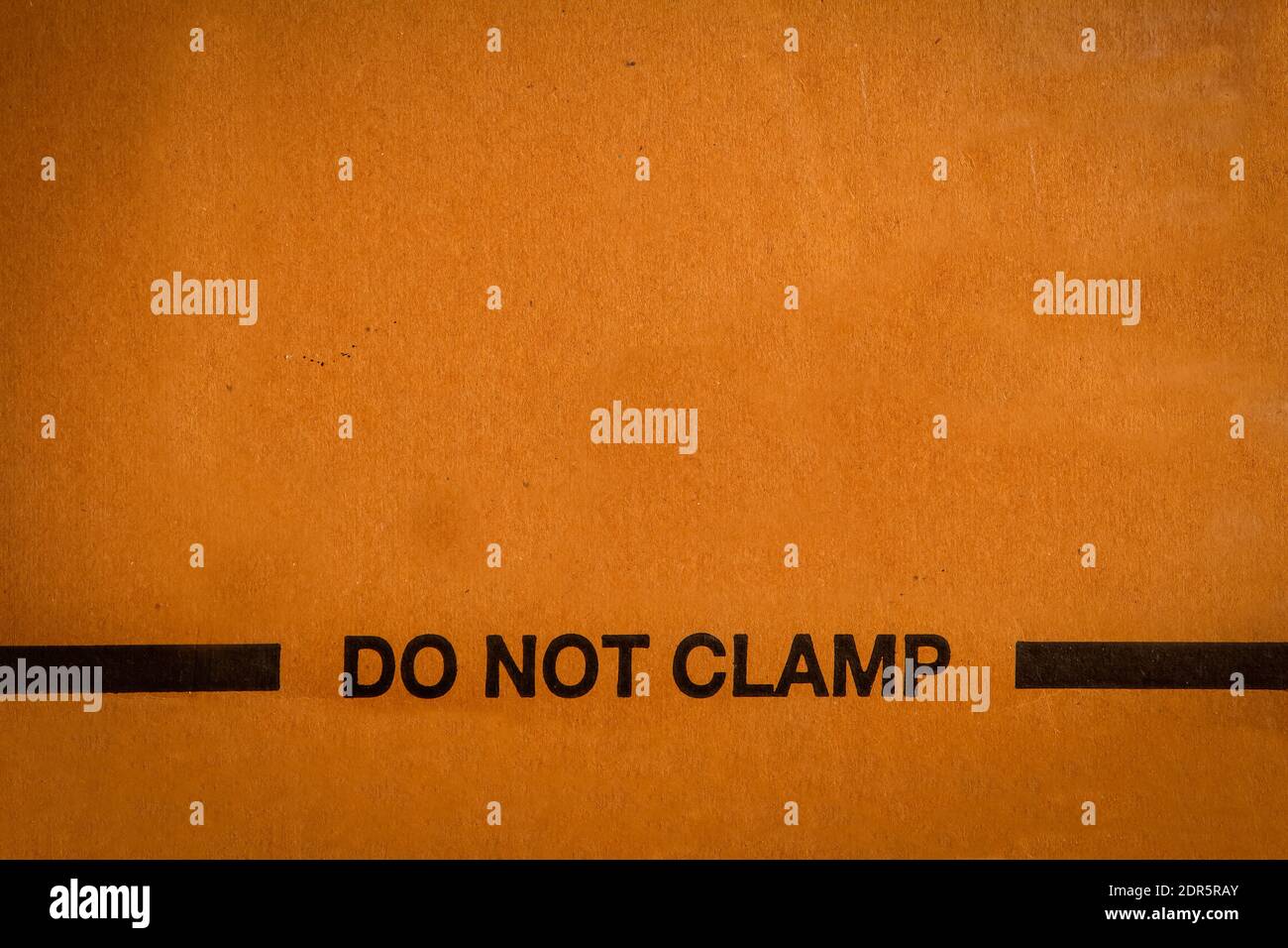 Packaging word to indicate not to clamp. Do not clamp instruction used ...