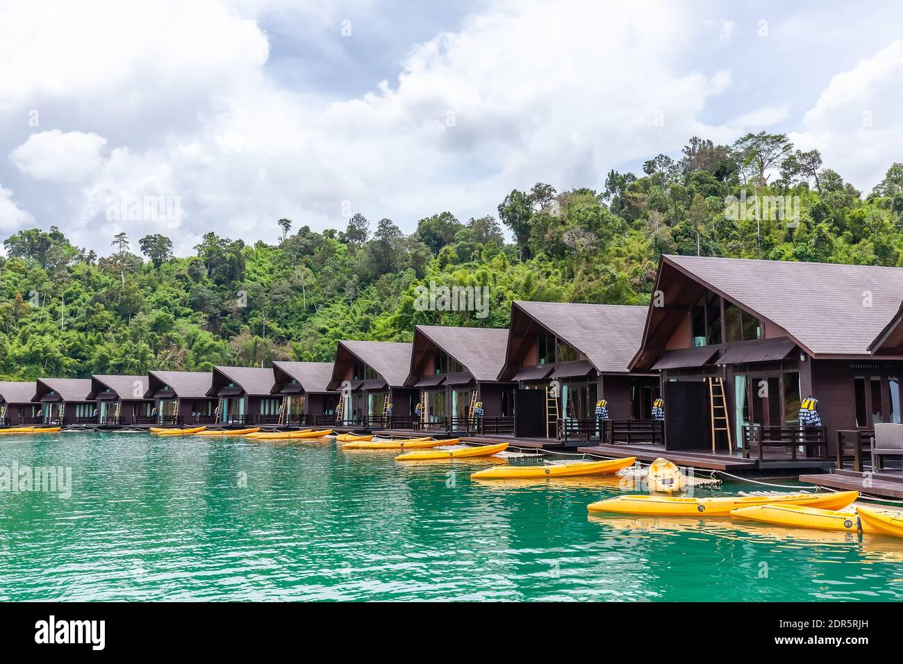 Luxury Resort with Floating Raft Houses on Green Lake with Tropical ...