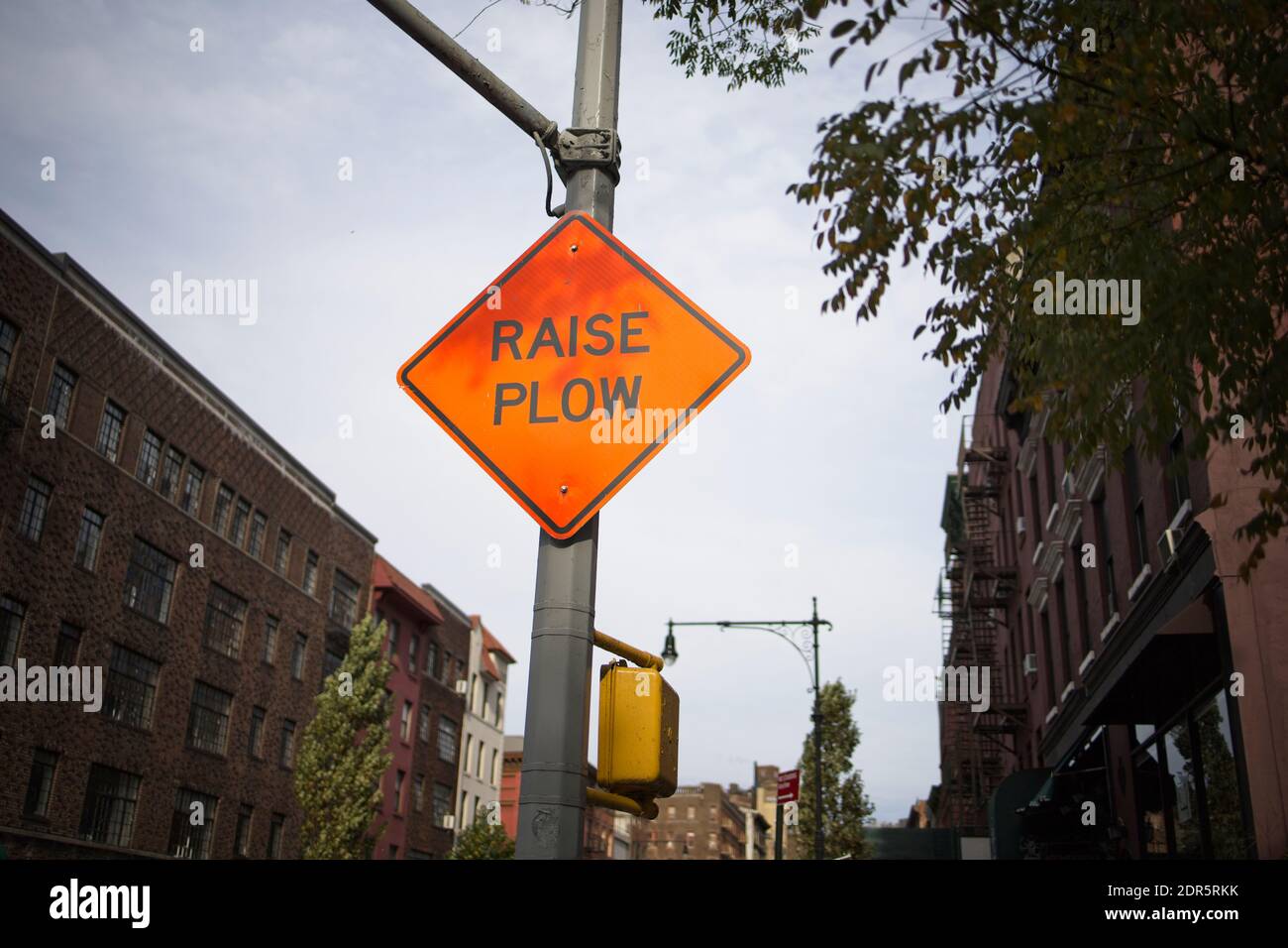 New York, NY, USA - Dec 20, 2020: Sign indicating RAISE PLOW to warn ...