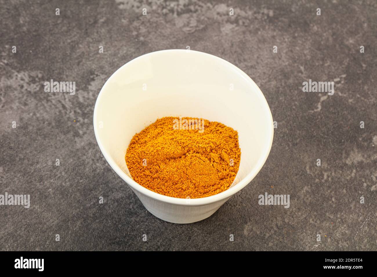 Indian traditional spices - Curry powder in the bowl Stock Photo - Alamy