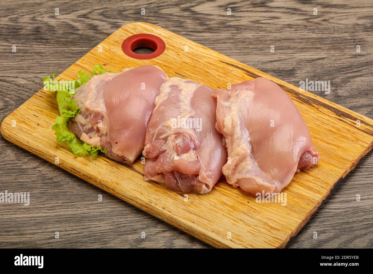 Raw chicken boneless and skinless leg for cooking Stock Photo - Alamy