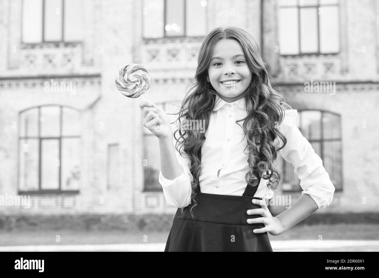 Sweet joy. Happy kid with sweet candy. Happy childhood. Kid child ...